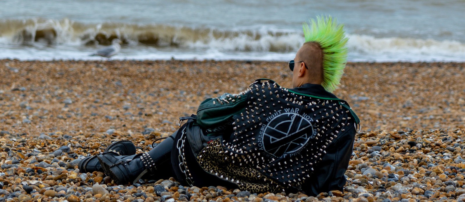 Which designer is famous for bringing punk into the mainstream?